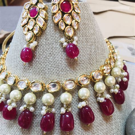 Ruby And Kundan Set With Semi Precious Kundan Ruby Gemstones And Beads Netradesignsolutions