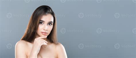A Naked Woman Striking A Pose With Her Hand Delicately Resting On Her Chin Showcasing A