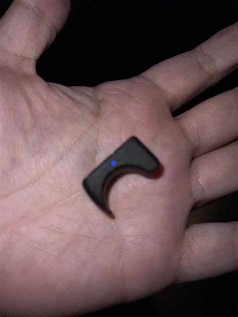 small blinking object blue and red about ring size in length r