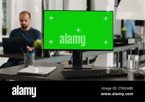 Greenscreen On Computer Desktop At Empty Workstation Pc With Isolated
