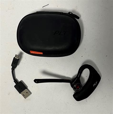 At Auction A Set Of Ear Buds Marked PLT With Additional Loose Ear Piece Cable