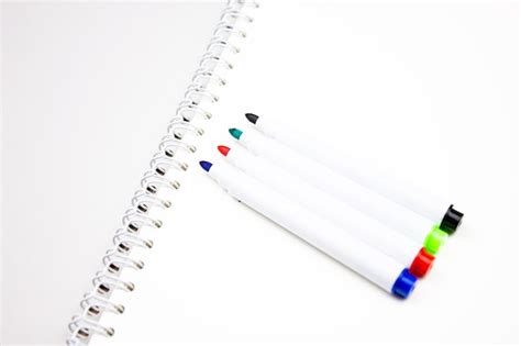 Premium Photo Colored Markers On A Notebook Markers For Writing On A