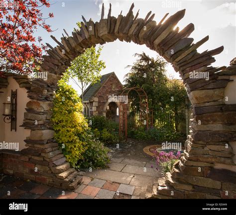 Moongate Made From Stone Stone Paving And Brick Structure Building