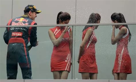 Sebastian Vettel Looked Delighted As He Posed With Nine Grid Girls At