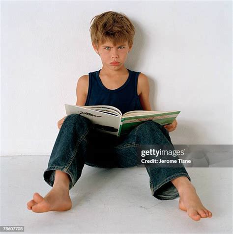 Boy Reading Comic Book Photos And Premium High Res Pictures Getty Images