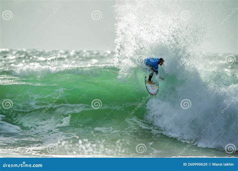 Gorgeous View On Ssurfer Ride The Wave Many Splashes In Sunbeams On