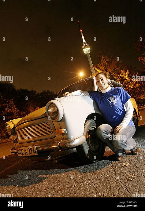 Daniela Feindor A Member Of Trabi Team Stuttgart Poses With A Trabbi In Front Of The Television