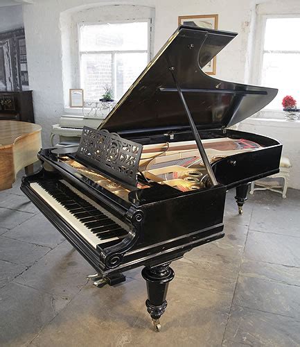 Antique Bechstein Model E Concert Grand Piano For Sale With A Black Case And Turned Legs