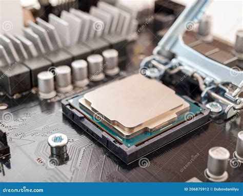 The Process Of Connecting The CPU To The Processor Socket On A Modern Computer Motherboard