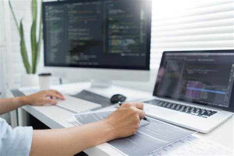premium photo software development concept male programmer pointing