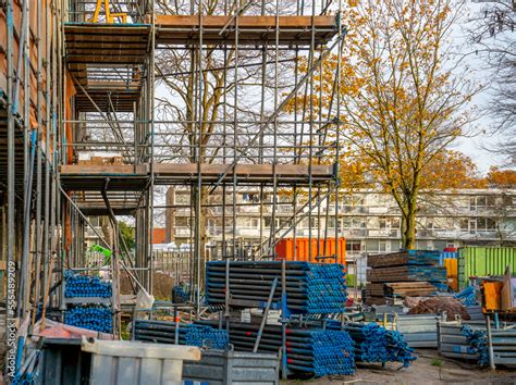 Scaffolding for construction of an apartment building in the Netherlands ภาพถายสตอก Adobe Stock