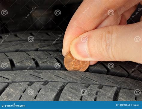 Checking Tire Tread Depth Wear With A Penny Tire Safety And Maintenance Stock Image Image Of