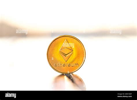 Ethereum Gold Color Coin With Sunset White Background Cryptocurrency