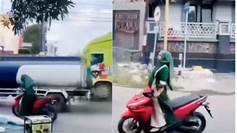 Viral Video Aksi Emak-emak Berkendara Motor Sambil Berdiri, Ujungnya Nyaris Tersenggol Truk ...