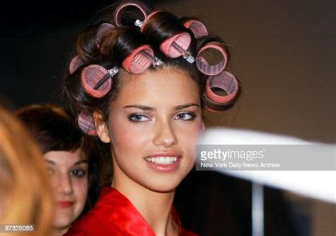 Supermodel Adriana Lima With Her Hair In Curlers Backstage Before The