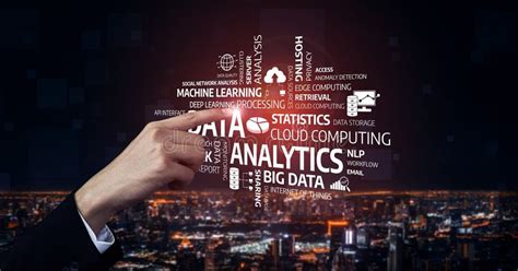 Hand Pointing At Data Analytics Concept With Dark City Skyline