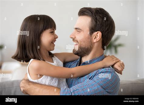 Cute Kid Girl Laughing Embracing Father Having Fun With Dad Stock Photo Alamy