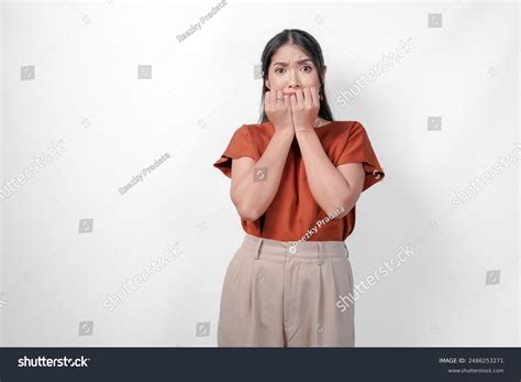 Scared Asian Woman Brown Shirt Looking Stock Photo Shutterstock