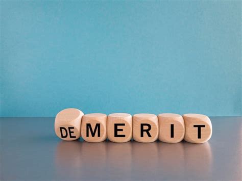 Premium Photo Demerit Or Merit Symbol Male Hand Flips The Wooden Cube