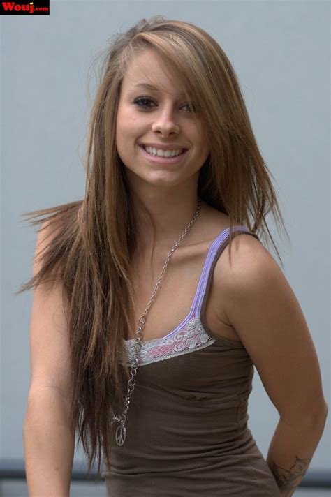 Amateur Babe With Arm Tattoos Poses Seductively Outdoors For The Camera