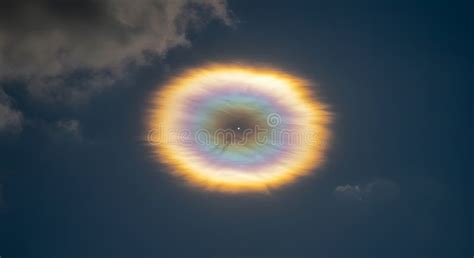 Majestic Sun Halo With Rainbow Hues In Cloudy Sky Stock Illustration