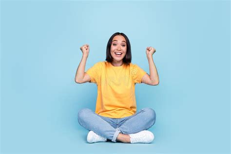 Full Body Size Photo Of Young Sitting Floor Korean Lady Fists Up