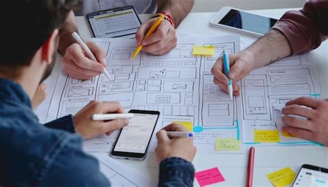 Mobile App Developer Brainstorming Smartphone Uiux Design Prototype Premium Ai Generated Image