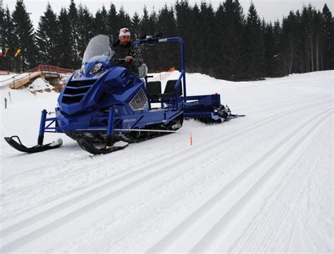 The Driver Is Using A Trick Alpina Snowmobiles