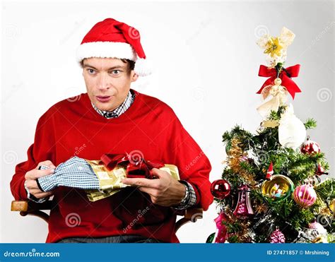 Man Unwrapping A Christmas Gift Stock Image Image Of Human Underwear