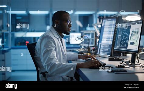 Modern Electronics Development Facility Male Engineer Works On Modern Electronics Development Facility Male Engineer Works On