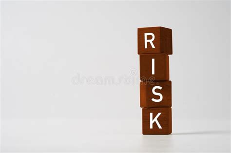 Risk Wording On Red Wooden Cube For Risk Assess Management Concept