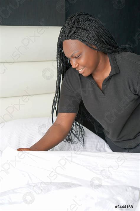 African Maid Making Bed Stock Photo Crushpixel