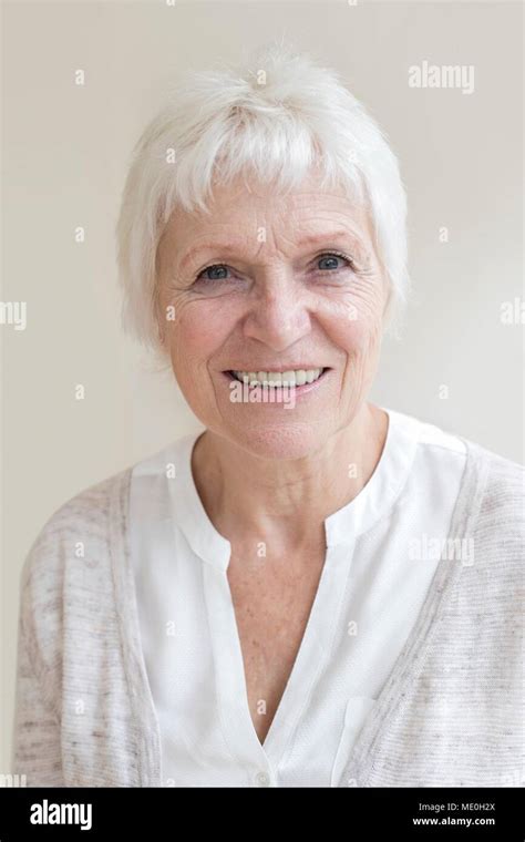 Senior Woman Smiling Towards Camera Portrait Stock Photo Alamy