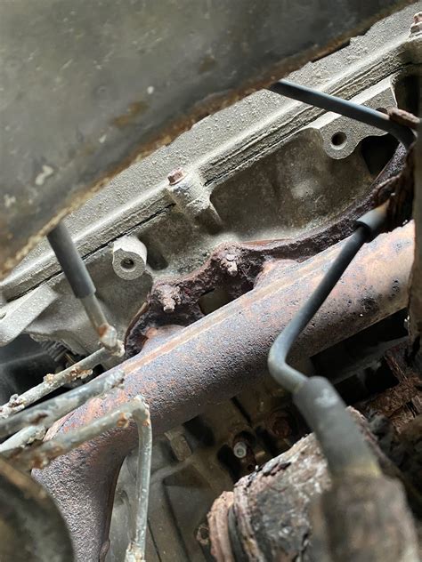 How can I remove these rusted exhaust manifold bolts? Newbie here : r ...