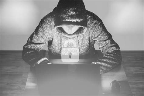 Premium Photo Man In Hoodie Is Hacking Personal Data Information Security Protection Of