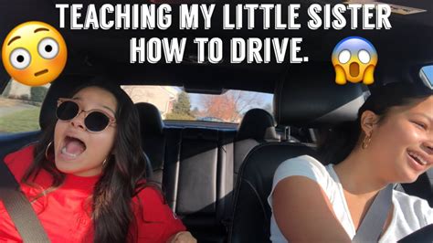 Teaching my little sister how to drive. We almost crash! - YouTube
