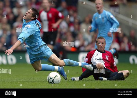 Grays Athletics Michael Kightly Is Fouled By Wokings Liam Cockerill