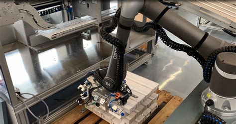 Omron Tm12 Cobot Automates Booklet Feeding For Kraus Maschinenbau