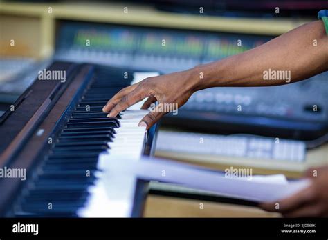 keyboard piano musical music system equipment hands fingers playing the