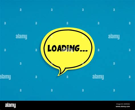 The Word Loading On Yellow Speech Bubble On Blue Background Technology