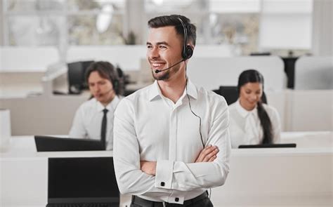 Premium Photo Positive Operator With Headset In Office