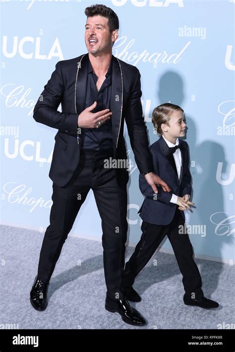 Singer Robin Thicke And Son Julian Fuego Thicke Arrive At The 2019