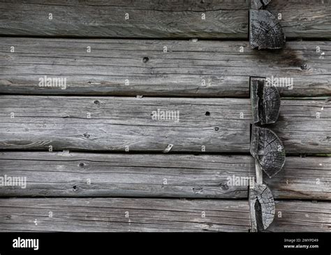 The Angular Part Of A Wooden House Made Of Logs In The Picture Shows A