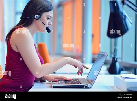 Businesswoman Showing Graph On Monitor In Office Stock Photo Alamy