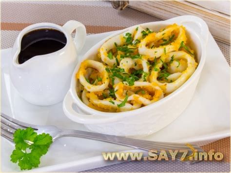 Кальмары, жаренные в панировочных сухарях