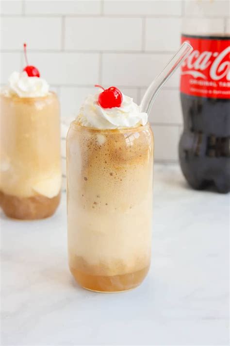 Coke Float In Glass Topped With Whipped Cream And A Cherry Baked