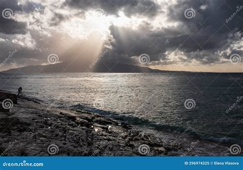 Dark Clouds And Sea Or Ocean Water Surface With Foam Waves Dramatic