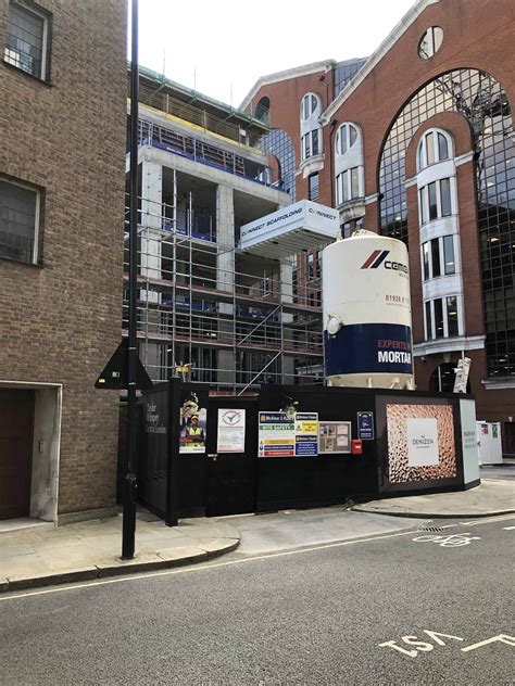 Crane Loading Platforms Connect Scaffolding