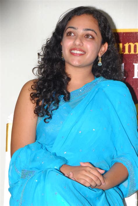 Sun Shines Nithya Menon In Blue Saree
