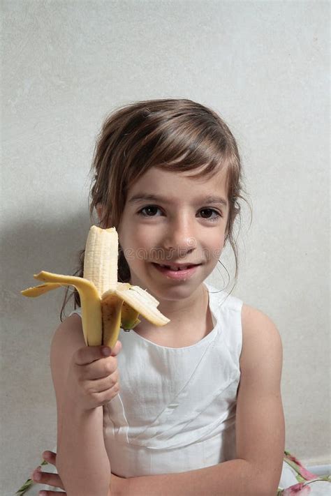 Girl With A Banana In His Hand Stock Image Image Of Smile Isolated